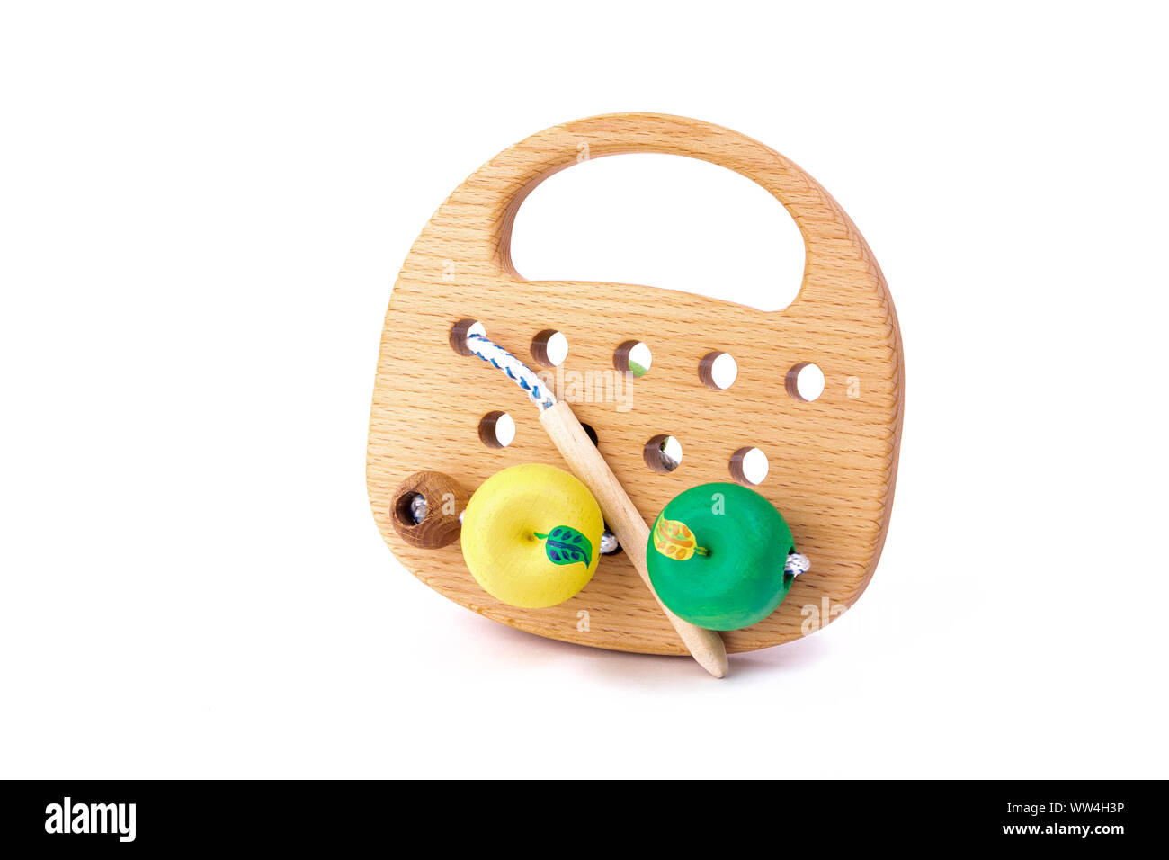 Photo of a wooden wooden toy with lace and beads of different colors on ...