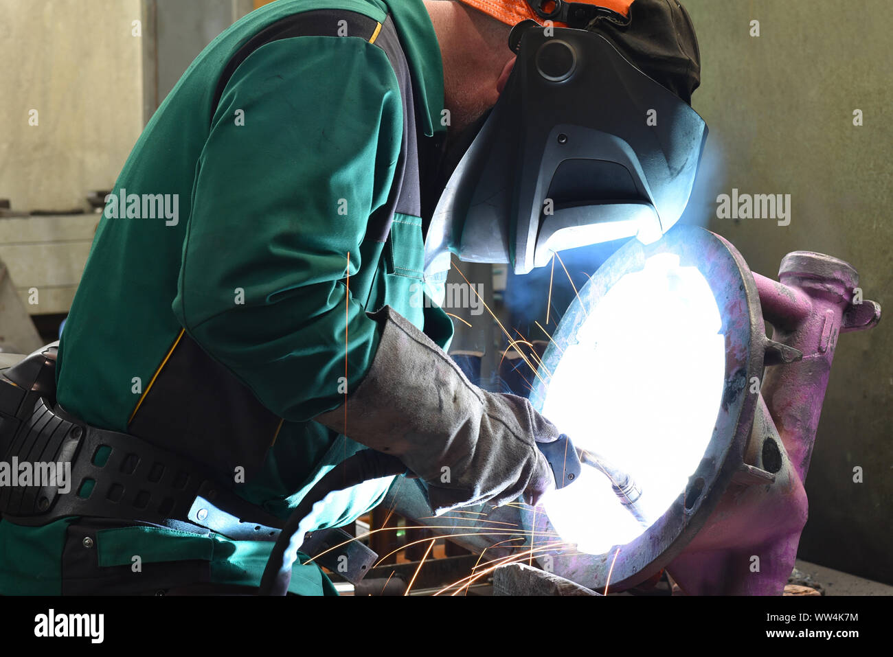 welder at work in an industrial company Stock Photo - Alamy