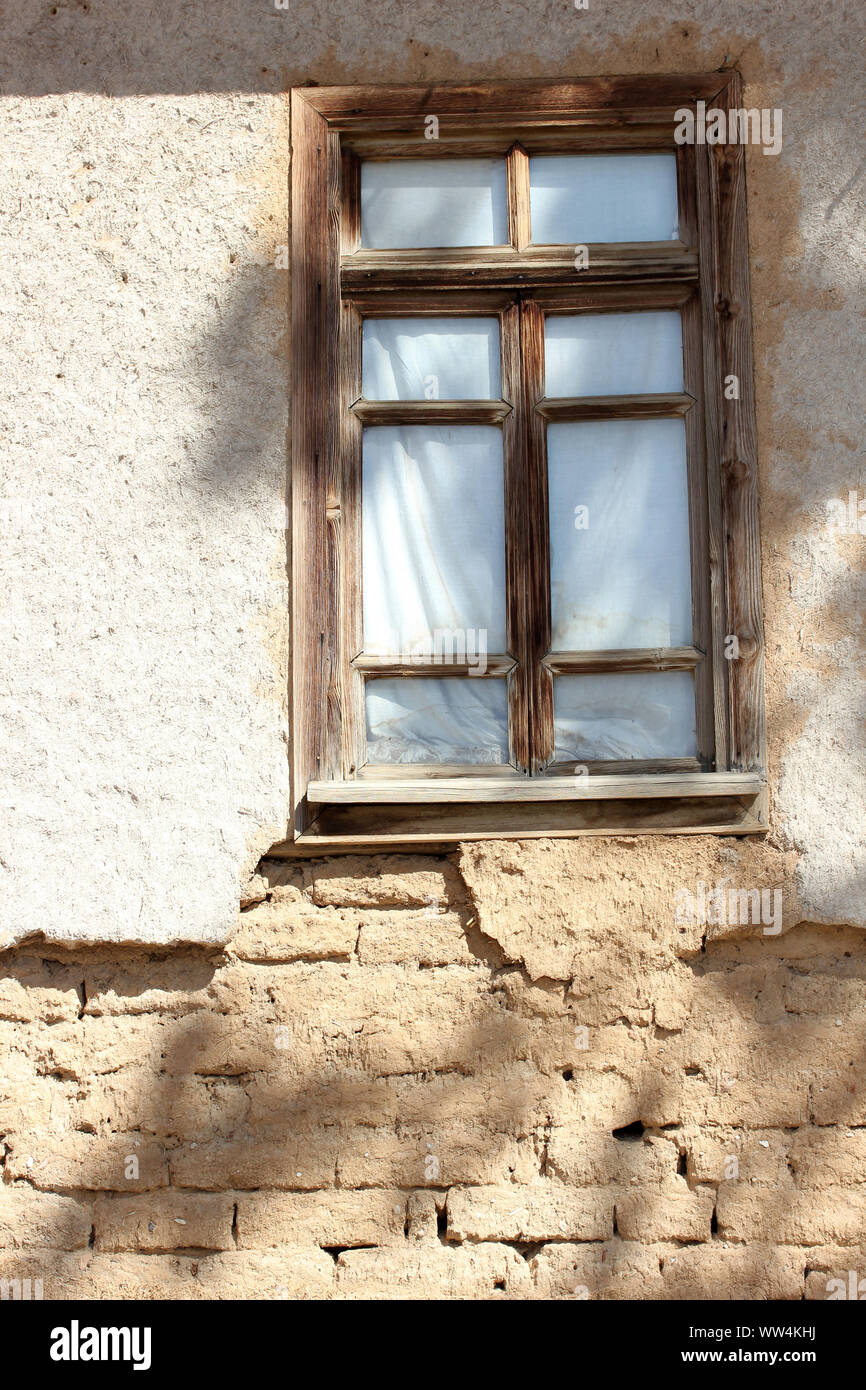 weathered adobe house and window Stock Photo - Alamy