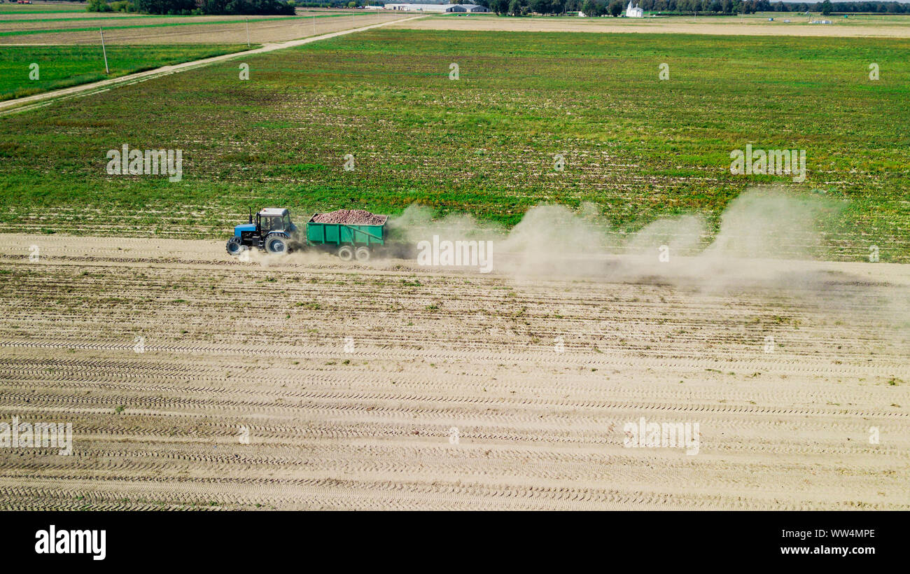 Tractor in a farmer field top view Stock Photo - Alamy