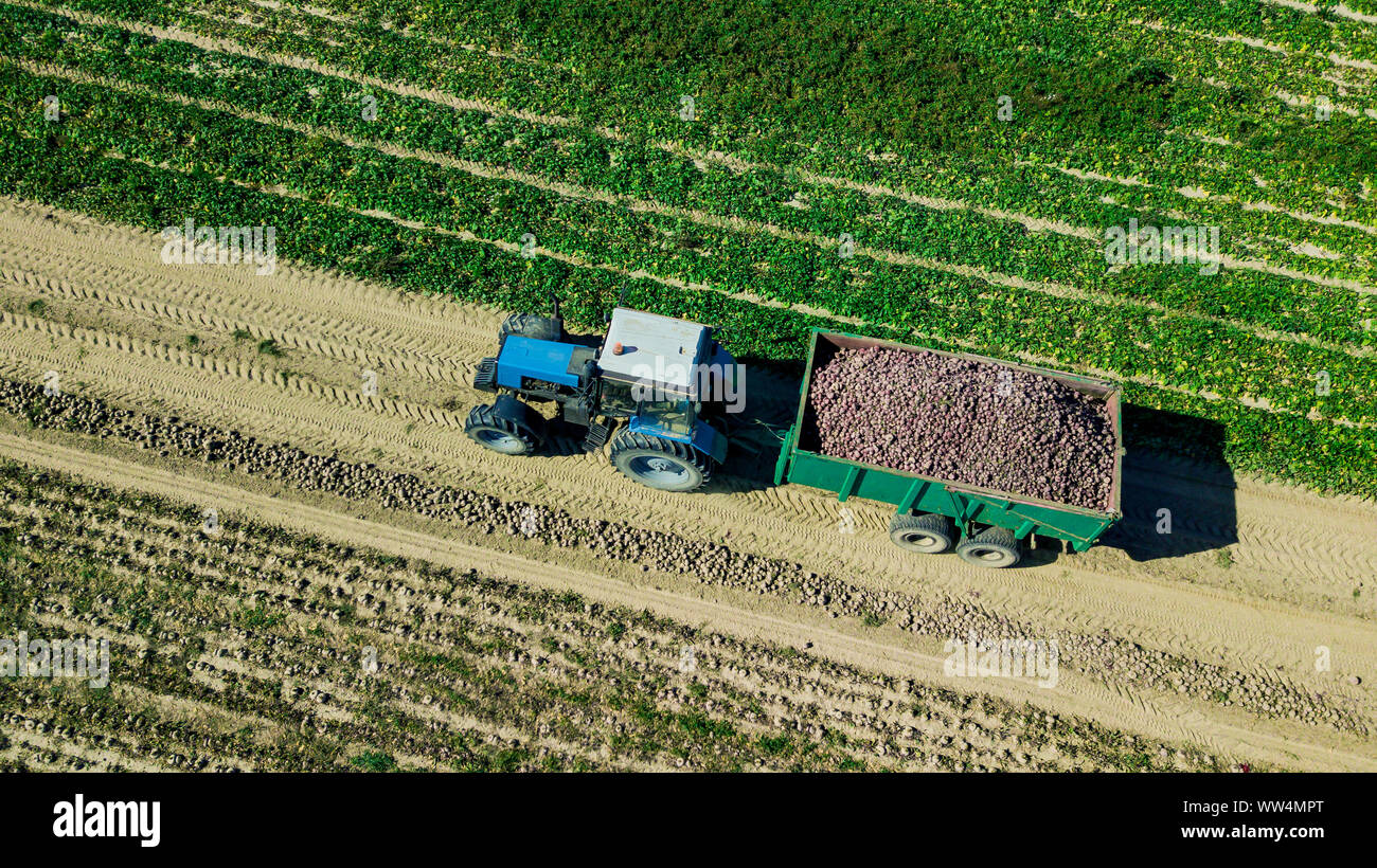 Tractor in a farmer field top view Stock Photo - Alamy