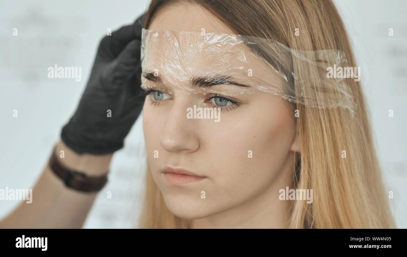 Fixing the film hi-res stock photography and images - Alamy