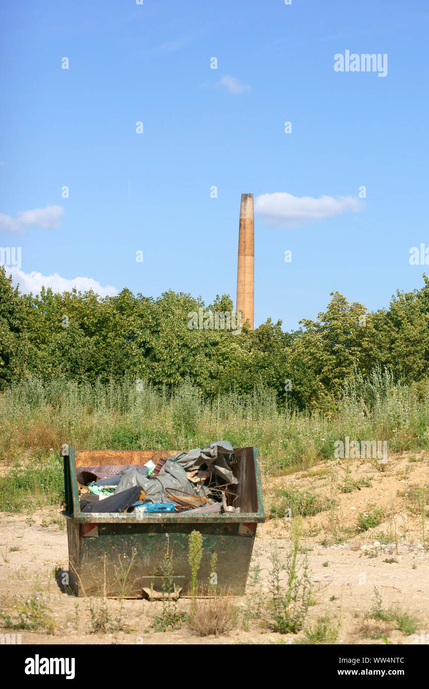 Photography of a garbage container in the middle of the landscape and ...