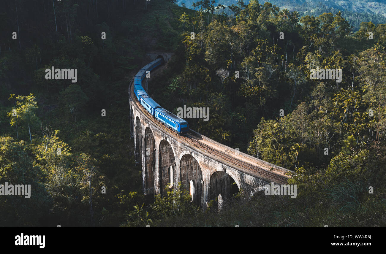 Train arriving at famous Nine arches bridge in Ella, Sri Lanka Stock ...