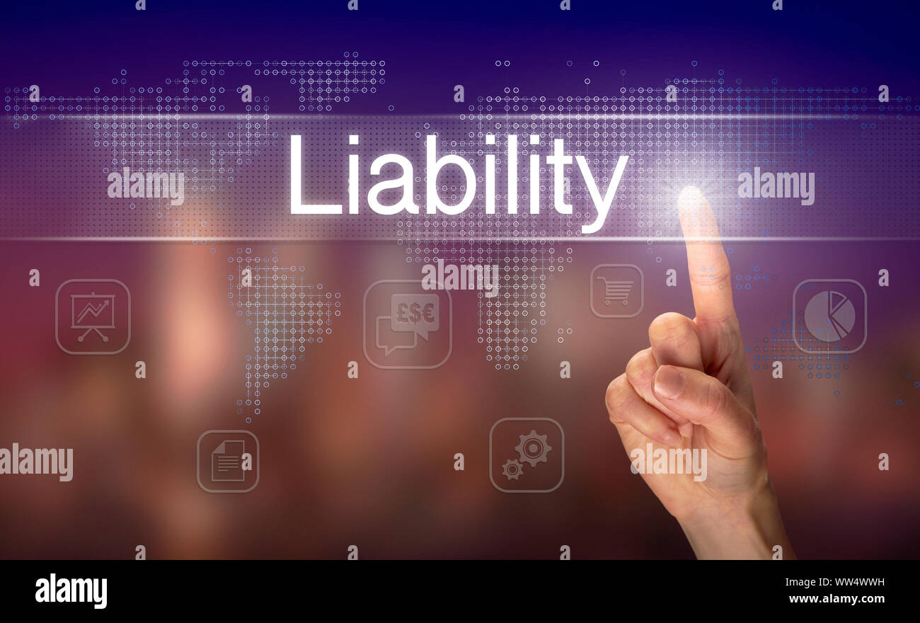 A hand selecting a Liability business concept on a clear screen with a ...