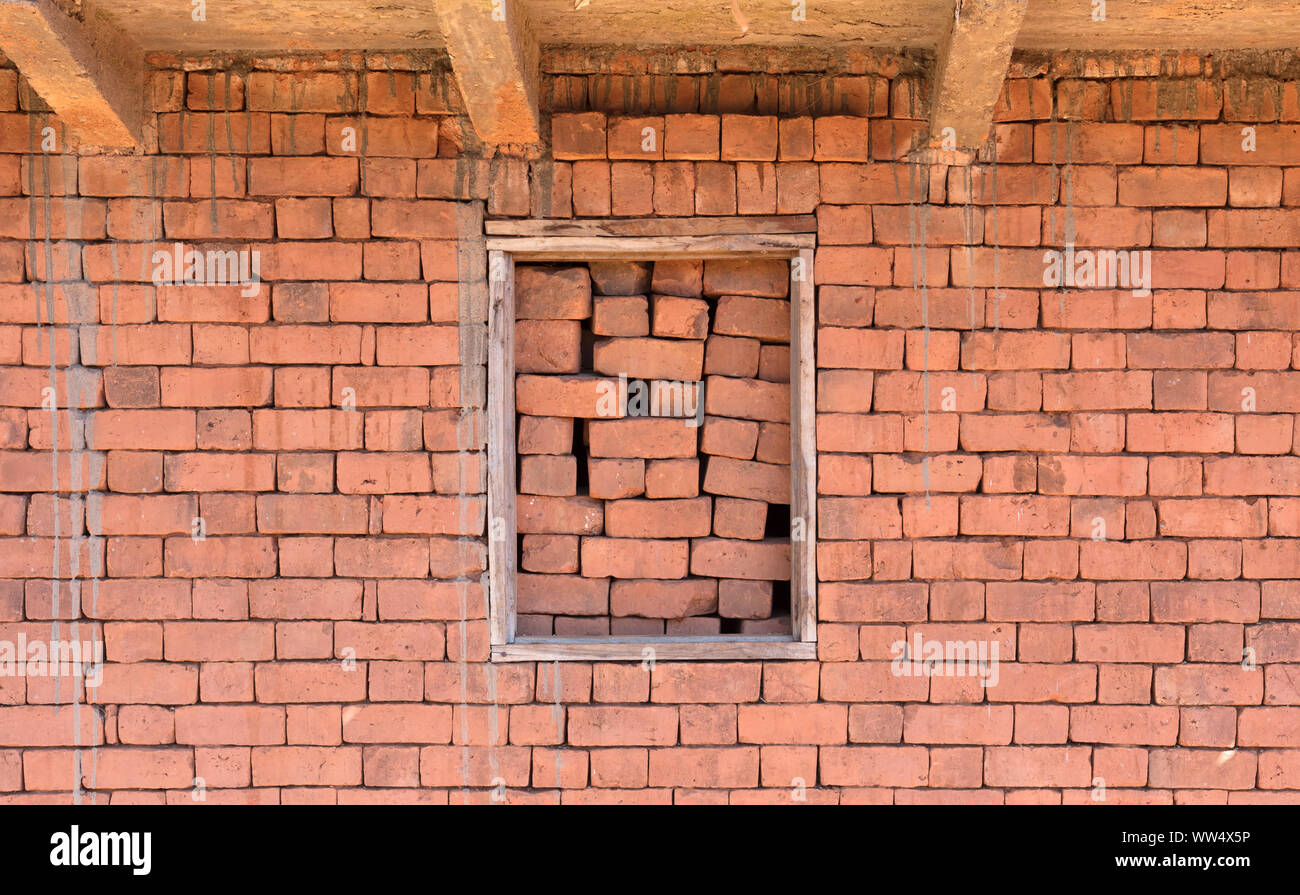 Window filled with bricks, house in Madagascar Stock Photo - Alamy