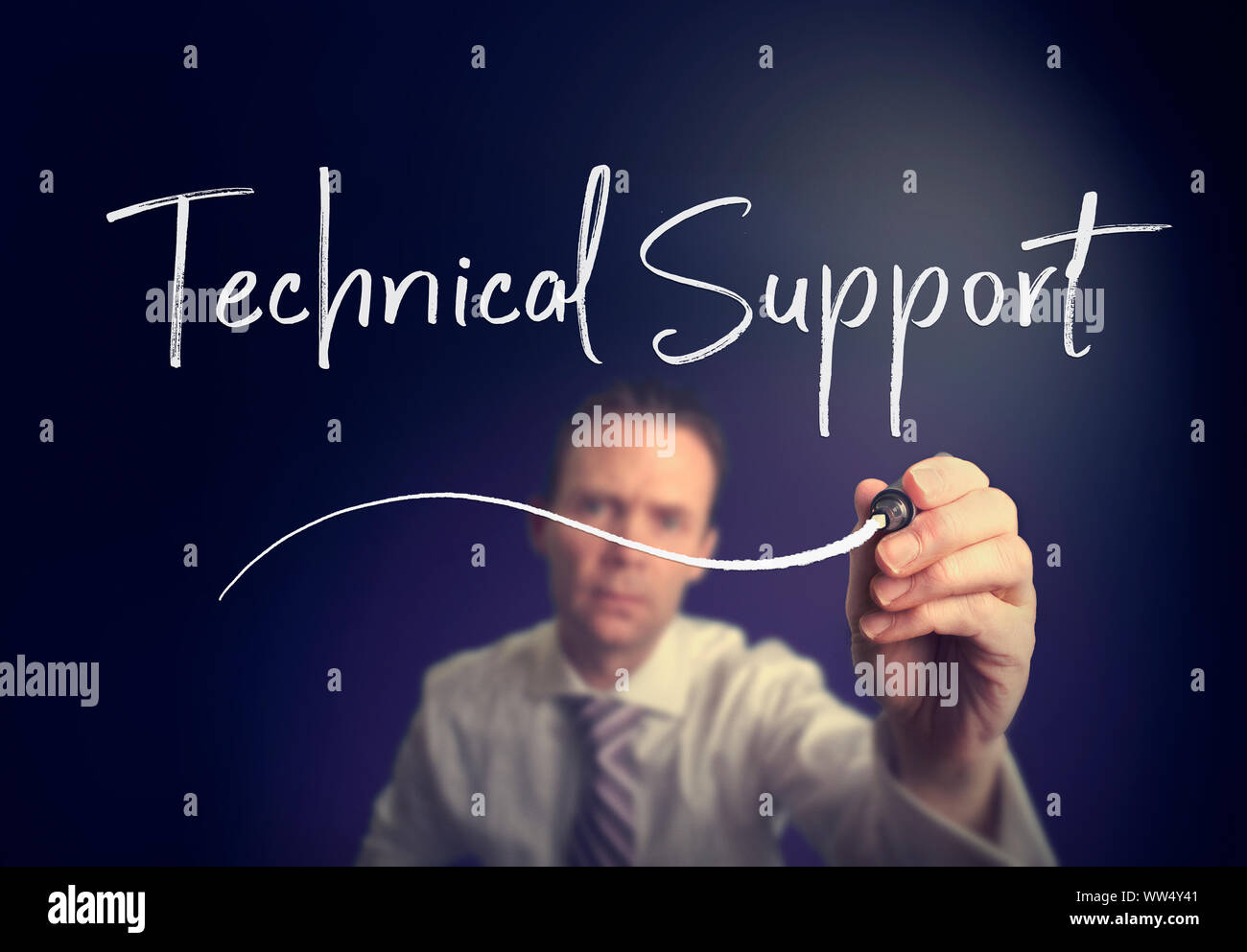 A businessman writing a Technical Support concept with a white pen on a ...