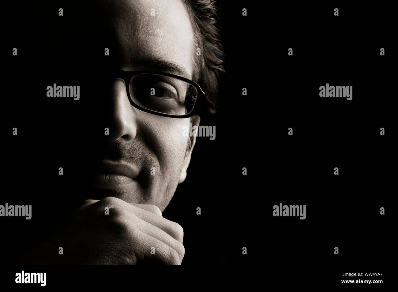 Content man looking straight Stock Photo - Alamy