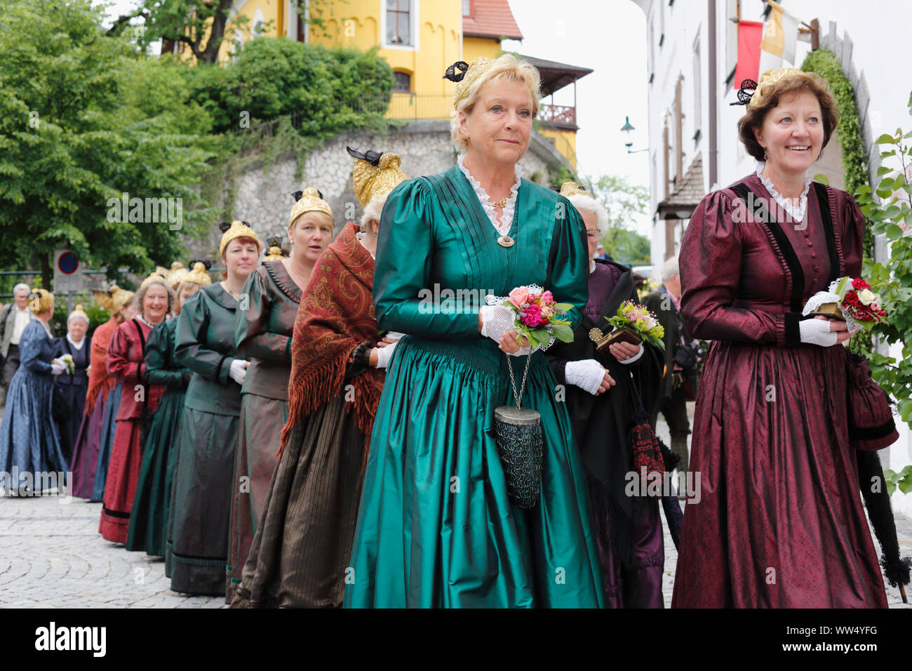 Women in traditional costume with golden bonnets during churchgoing at ...