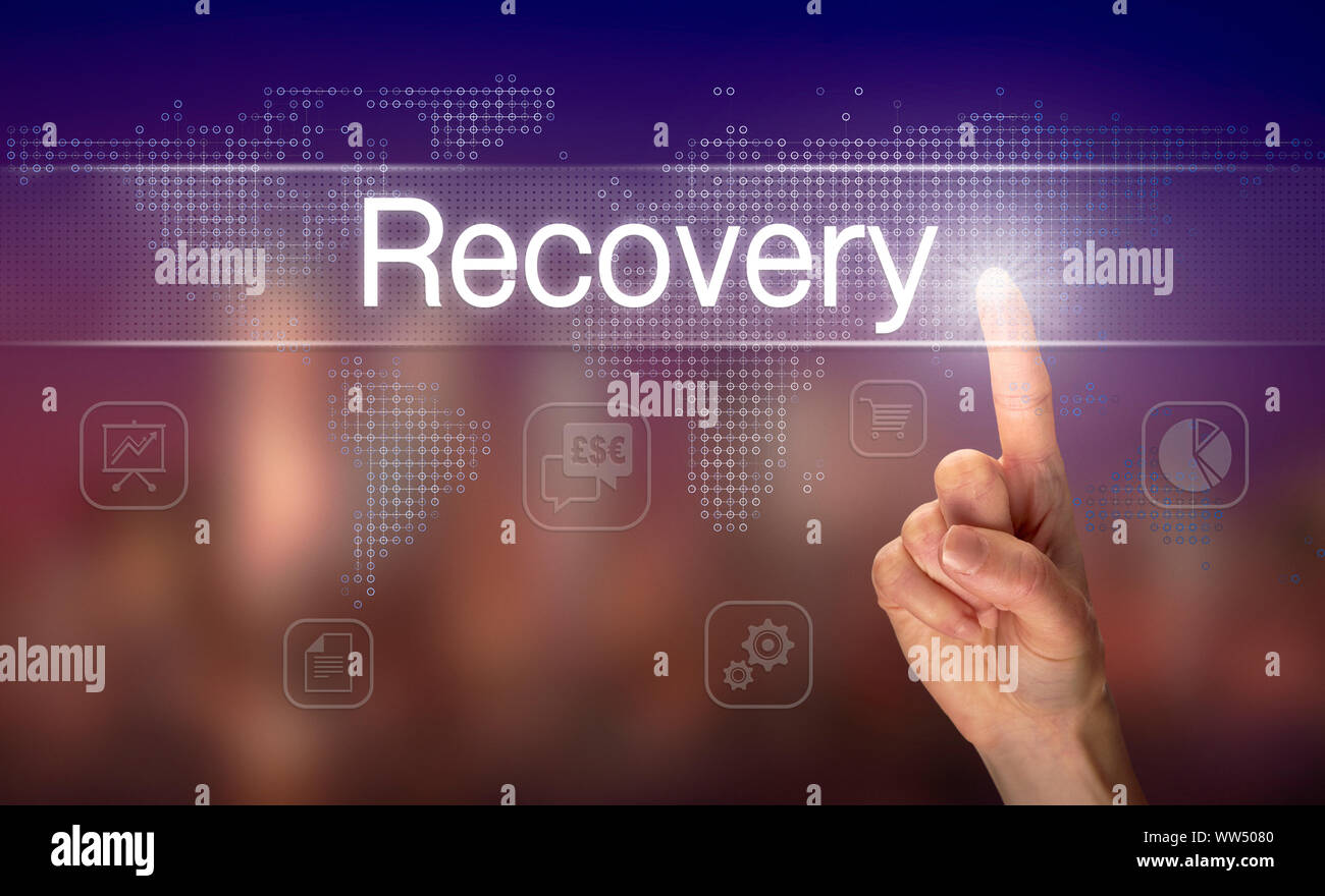 A hand selecting a Recovery business concept on a clear screen with a ...