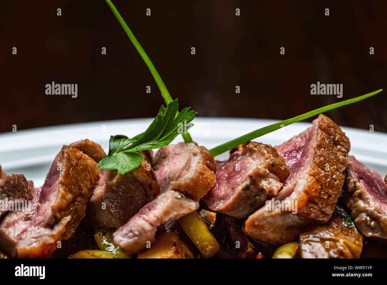 Gourmet roast beef dish with rare meat and extreme detail Stock Photo ...