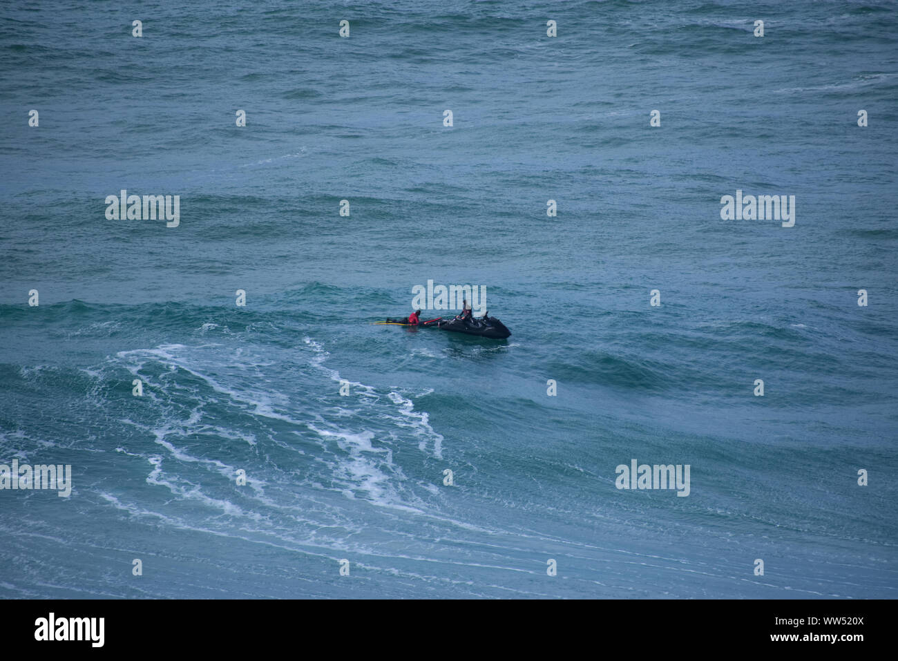 Surfing the big waves of Nazaré in Portugal Stock Photo - Alamy