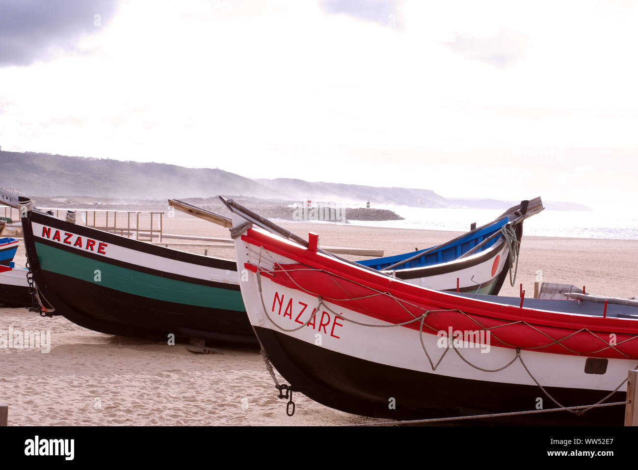 Fishing Boats at Nazare Beach Stock Photo - Alamy