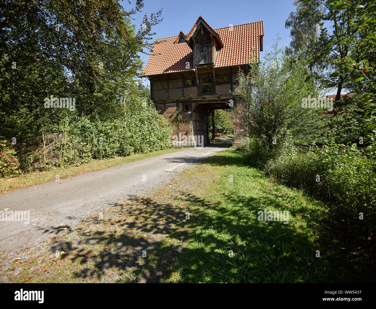 Gate house with passage and way in front of it Stock Photo - Alamy