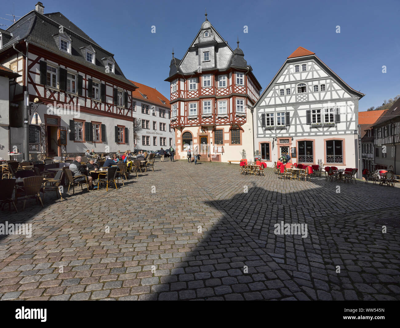 Town square with cobblestones and old buildings in the background Stock ...