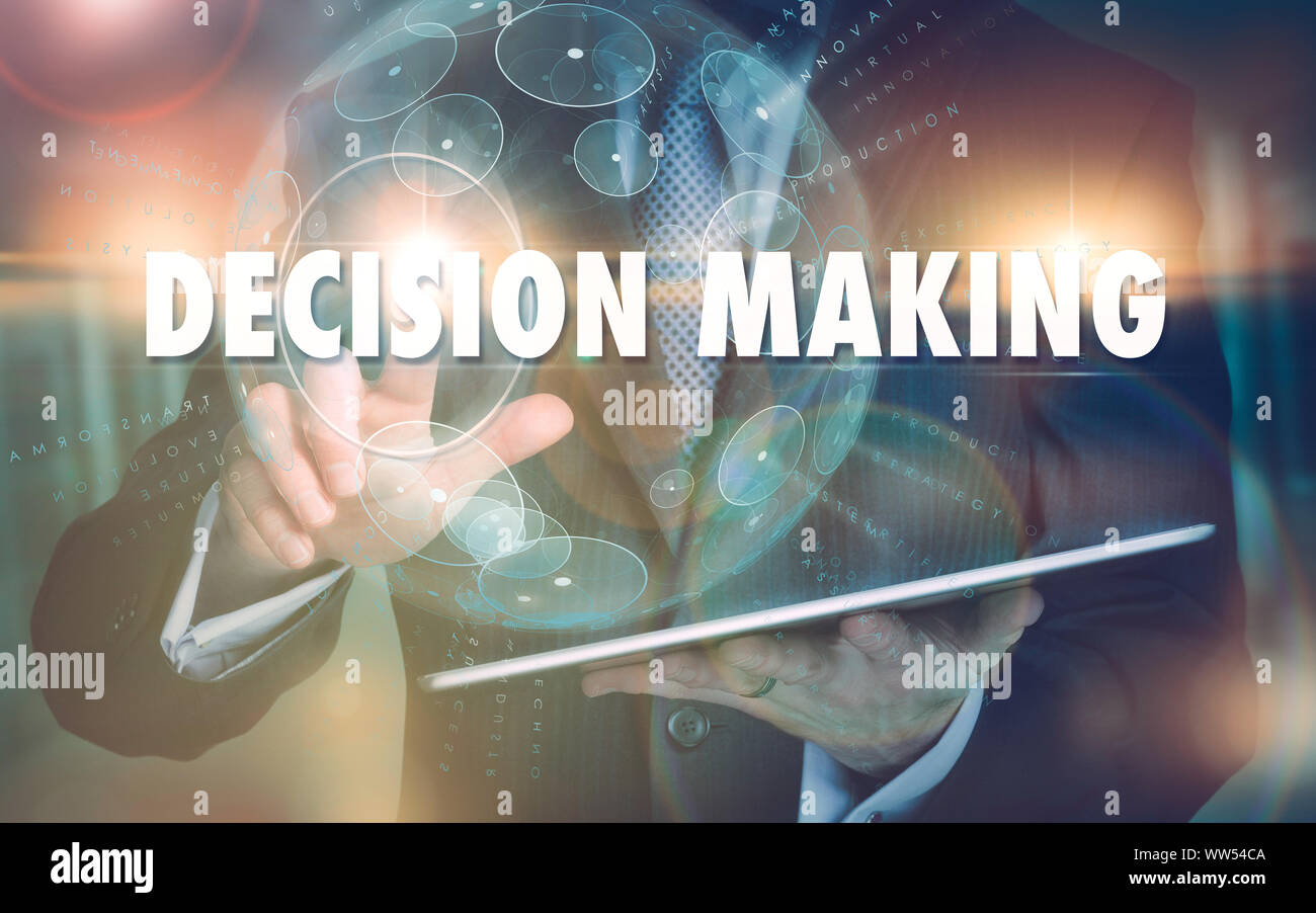 A hand selecting a Decision Making business concept on a futuristic ...