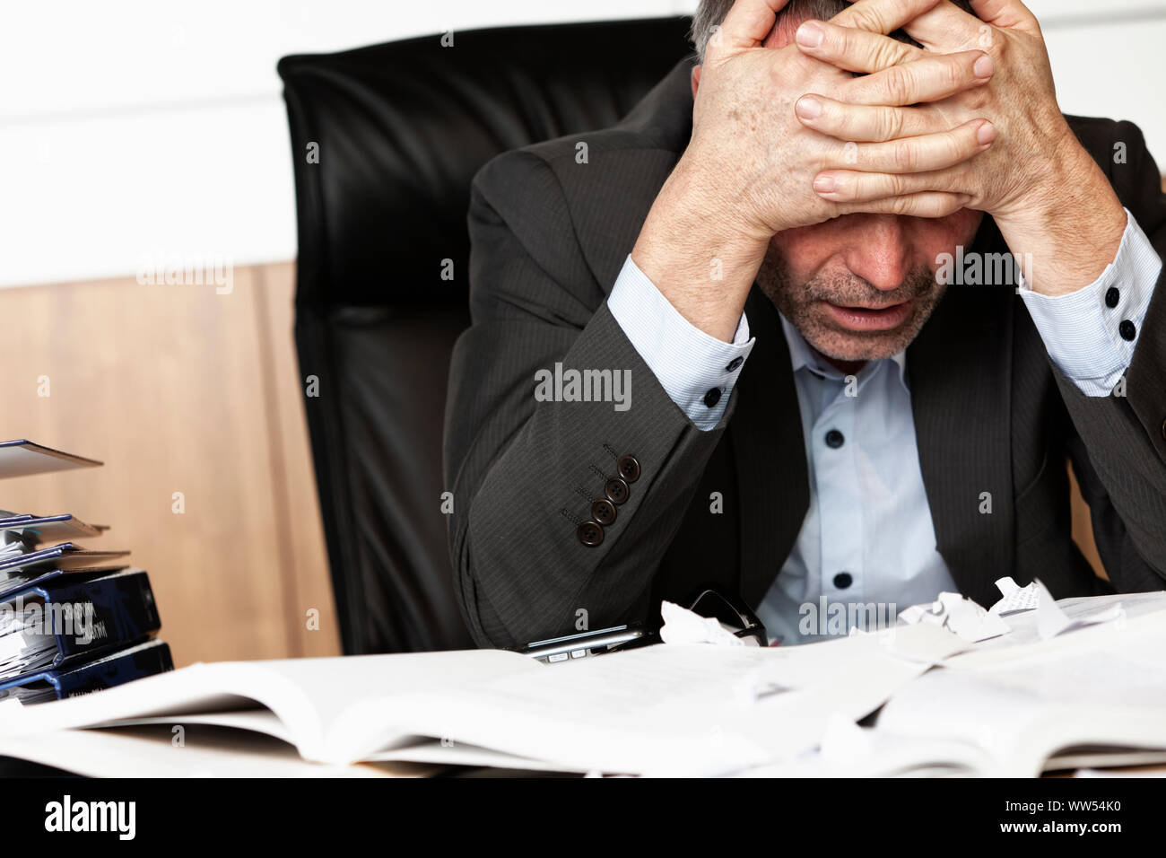Person at desk overloaded with work hi-res stock photography and images ...