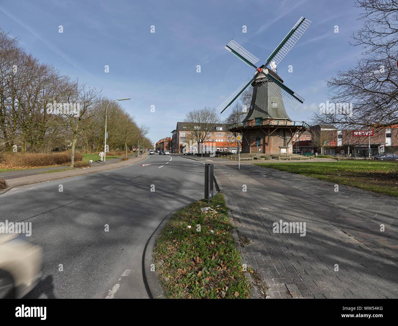 Windmill with street in front of it Stock Photo - Alamy
