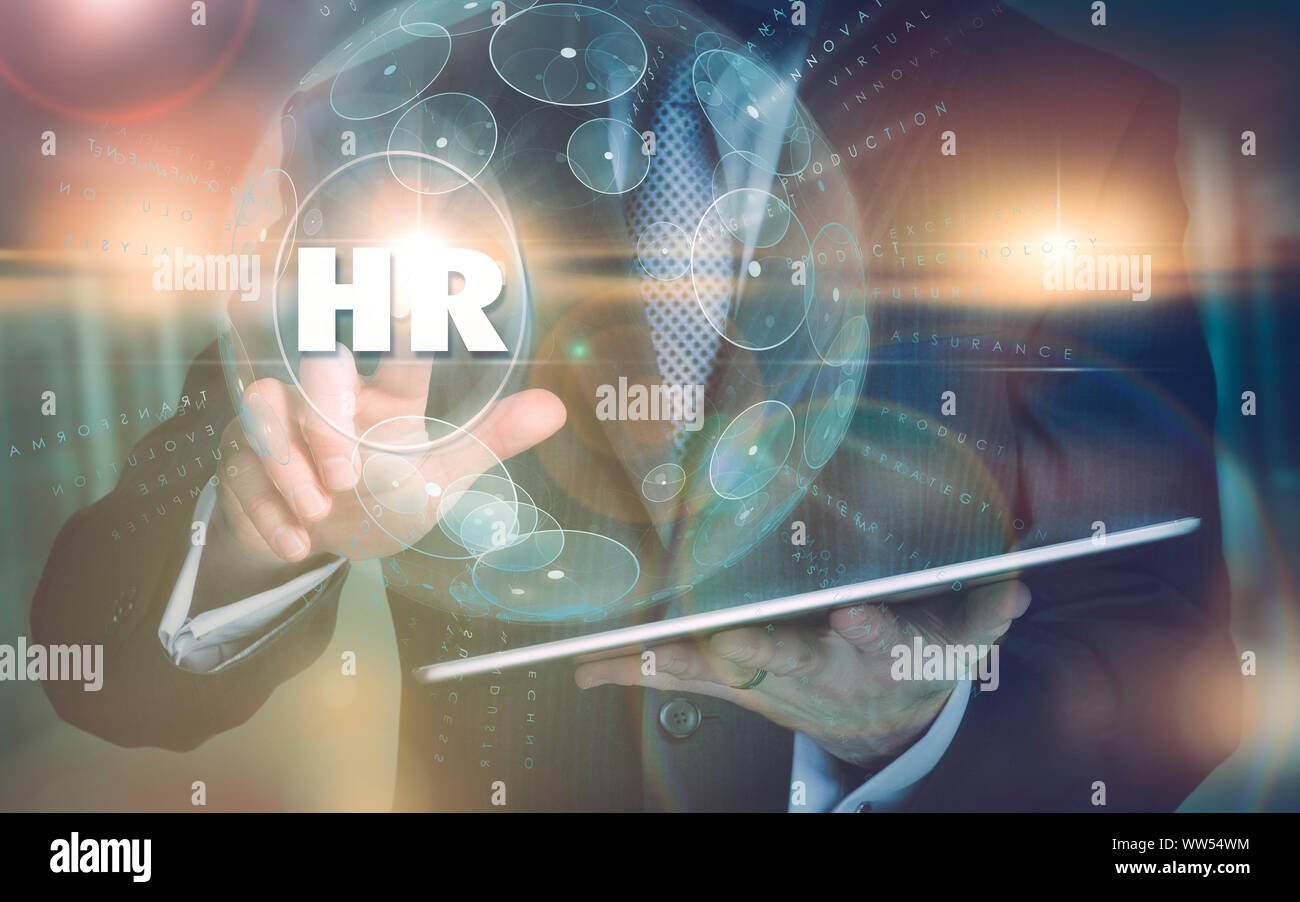A hand selecting a HR business concept on a futuristic computer display ...