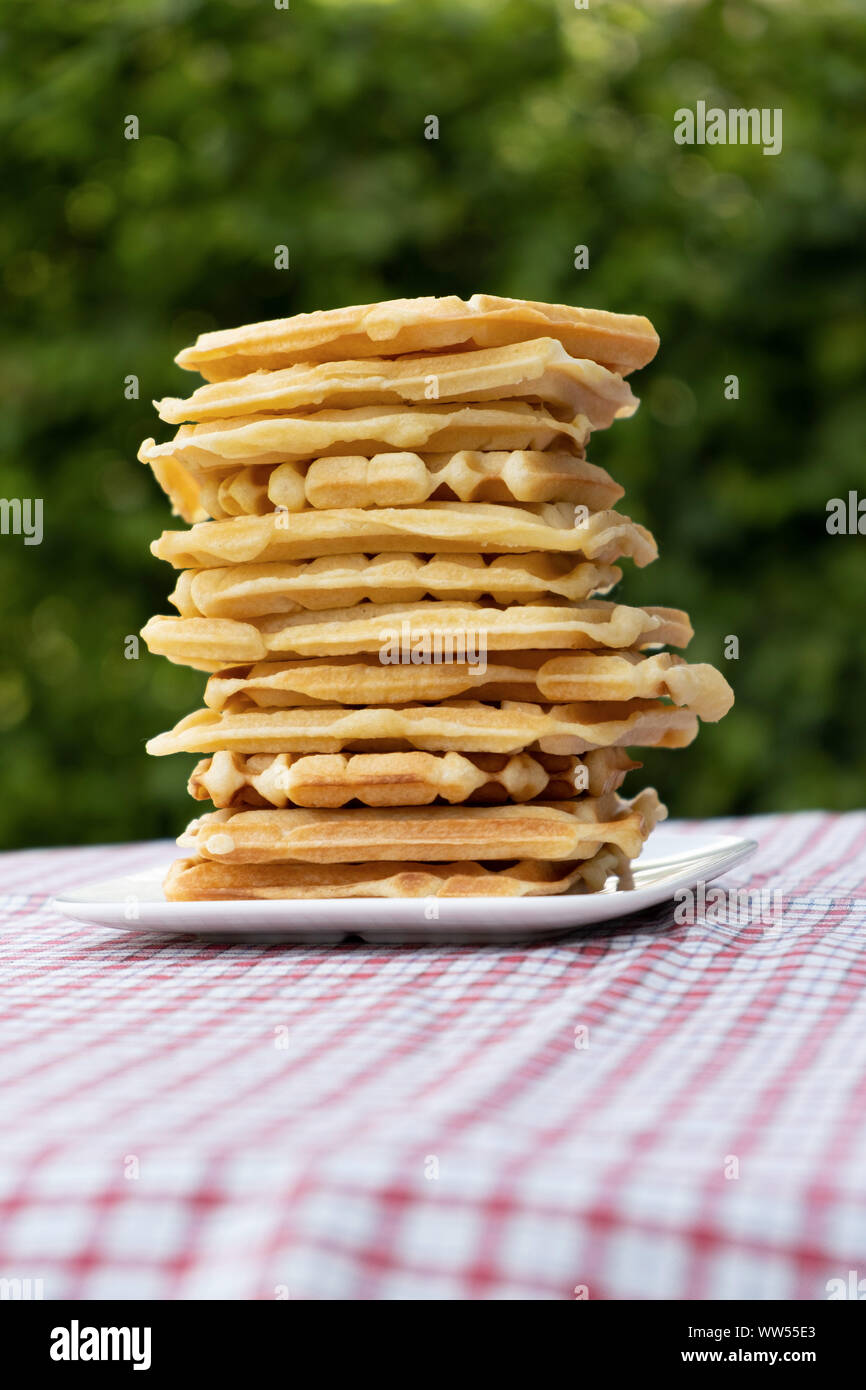 Stack of Belgian waffles on a table Stock Photo - Alamy