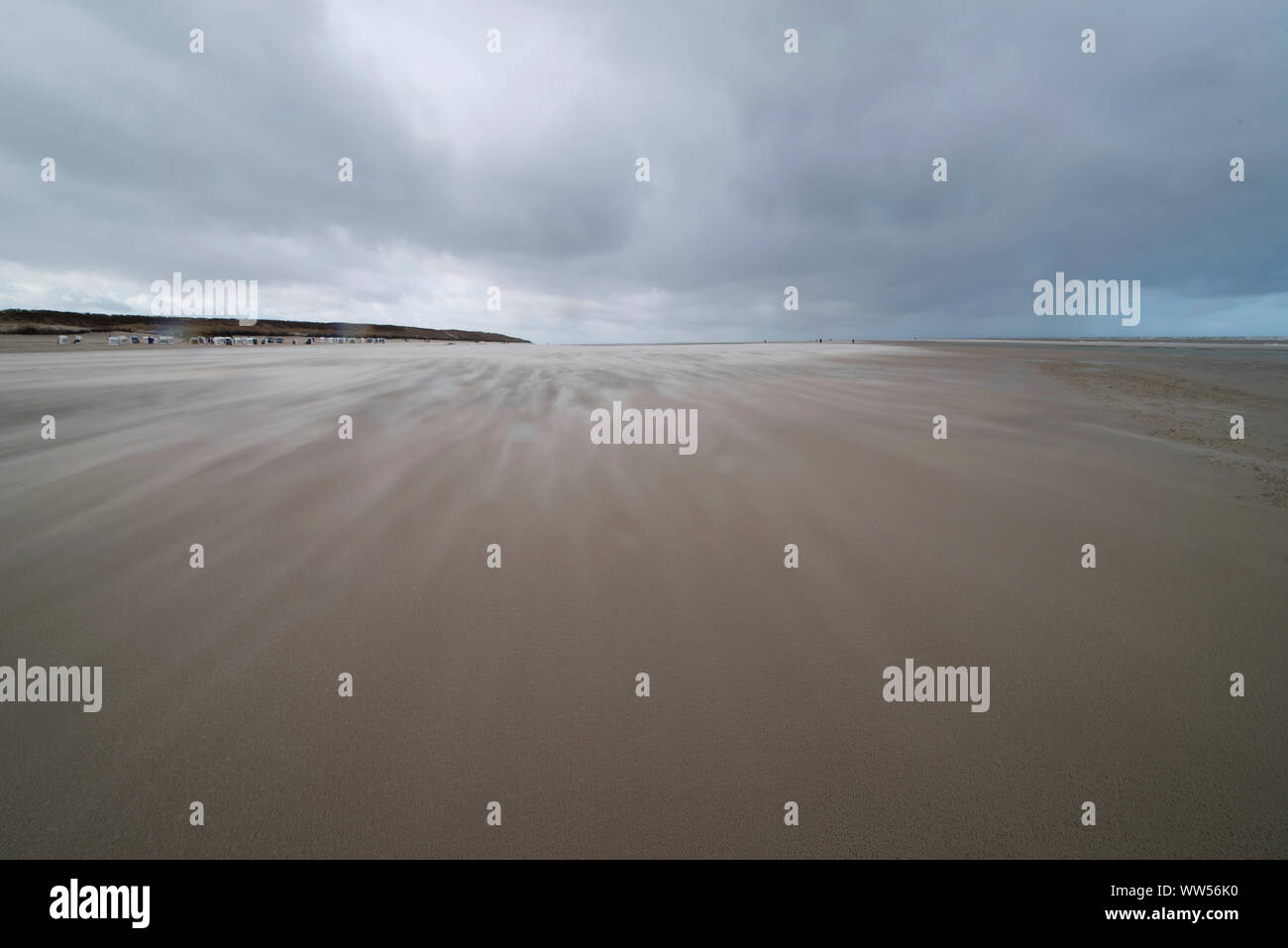 Sand blowing on the beach Stock Photo - Alamy