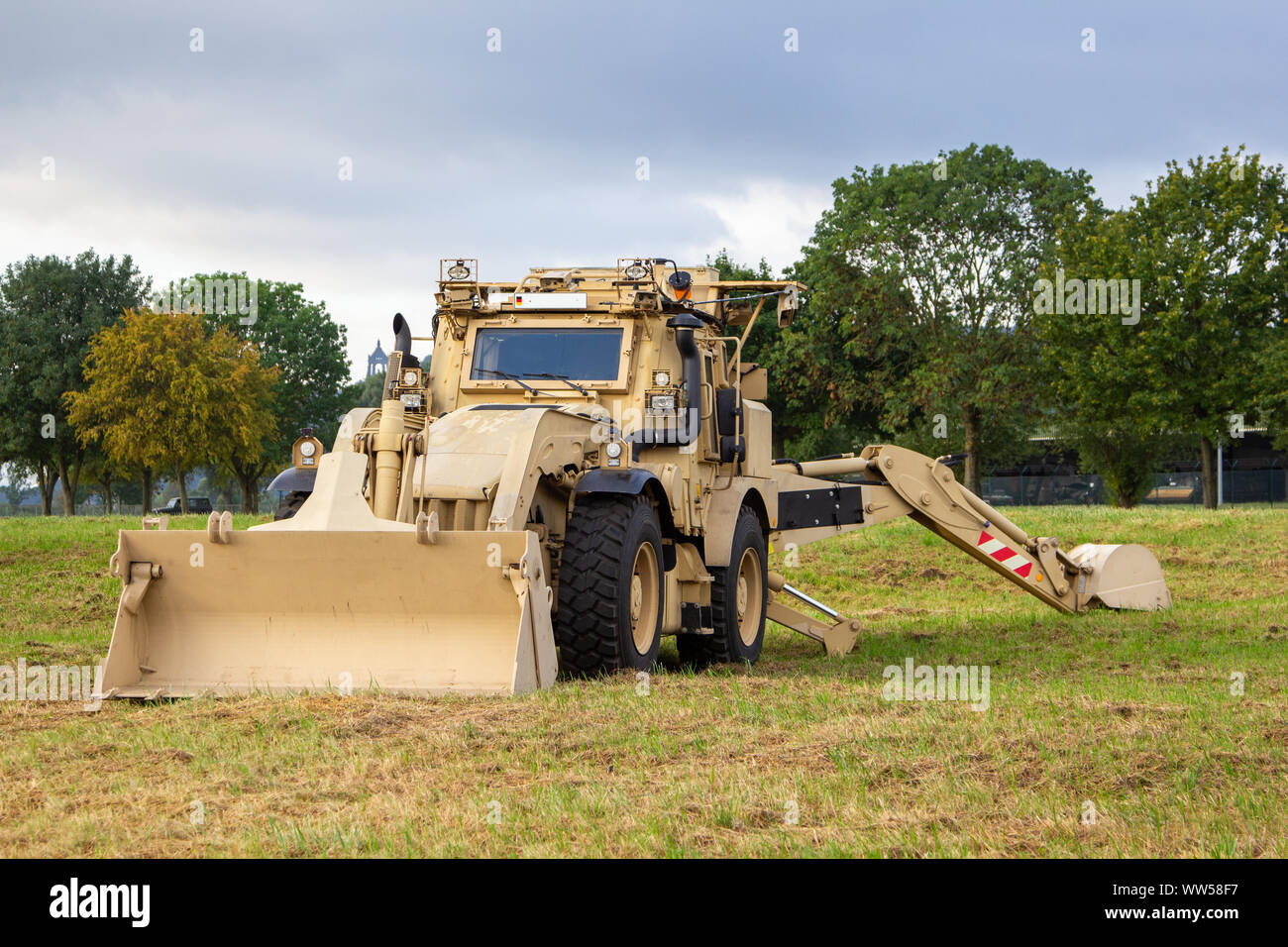 Armored wheel loader in deser camouflage from german army Stock Photo - Alamy