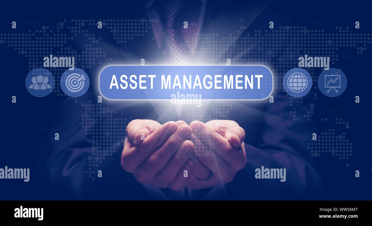 Businessmans cupped hands holding a Asset Management business concept ...