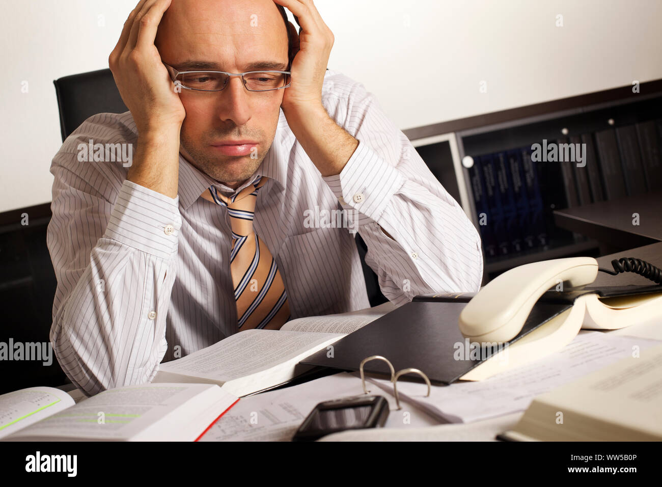 Stressed adult businessman Stock Photo - Alamy