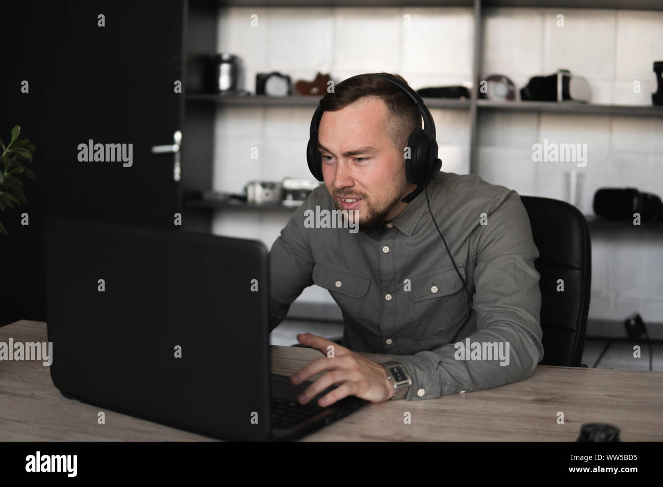 Man computer looking monitor confused hi-res stock photography and ...