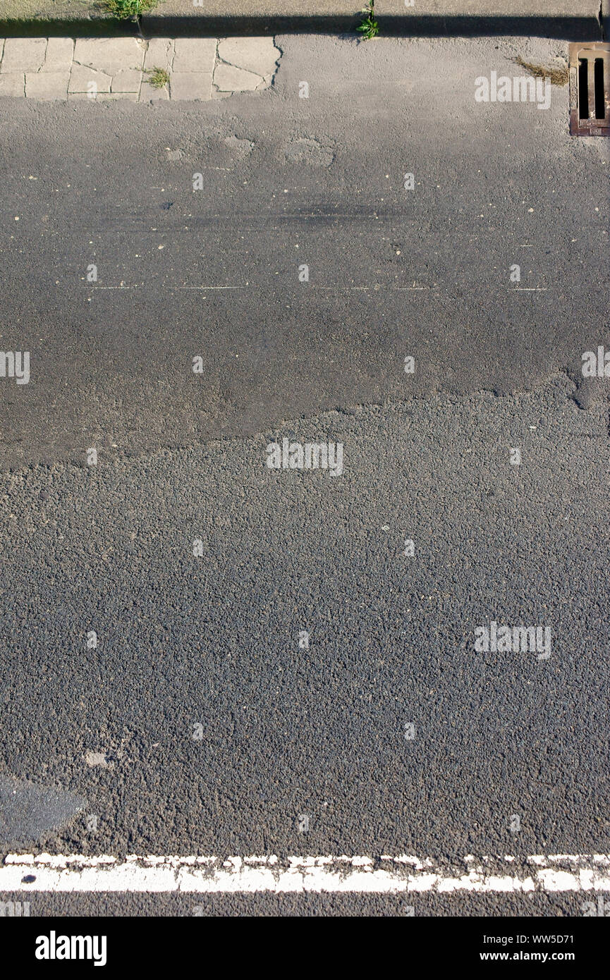 The top view on the fragile asphalt of a freeway with a drain Stock ...