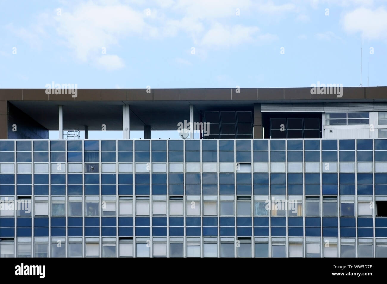 Facade, office building with roof shelter and satellite dish Stock ...