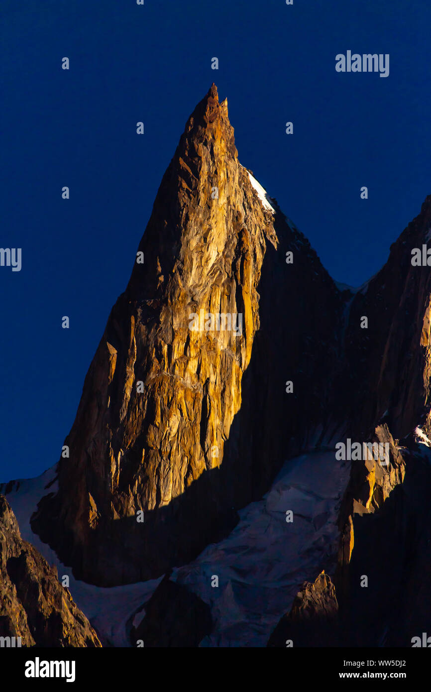Sunrise and the beautiful Lady finger and Ultar Sar Peaks Stock Photo ...