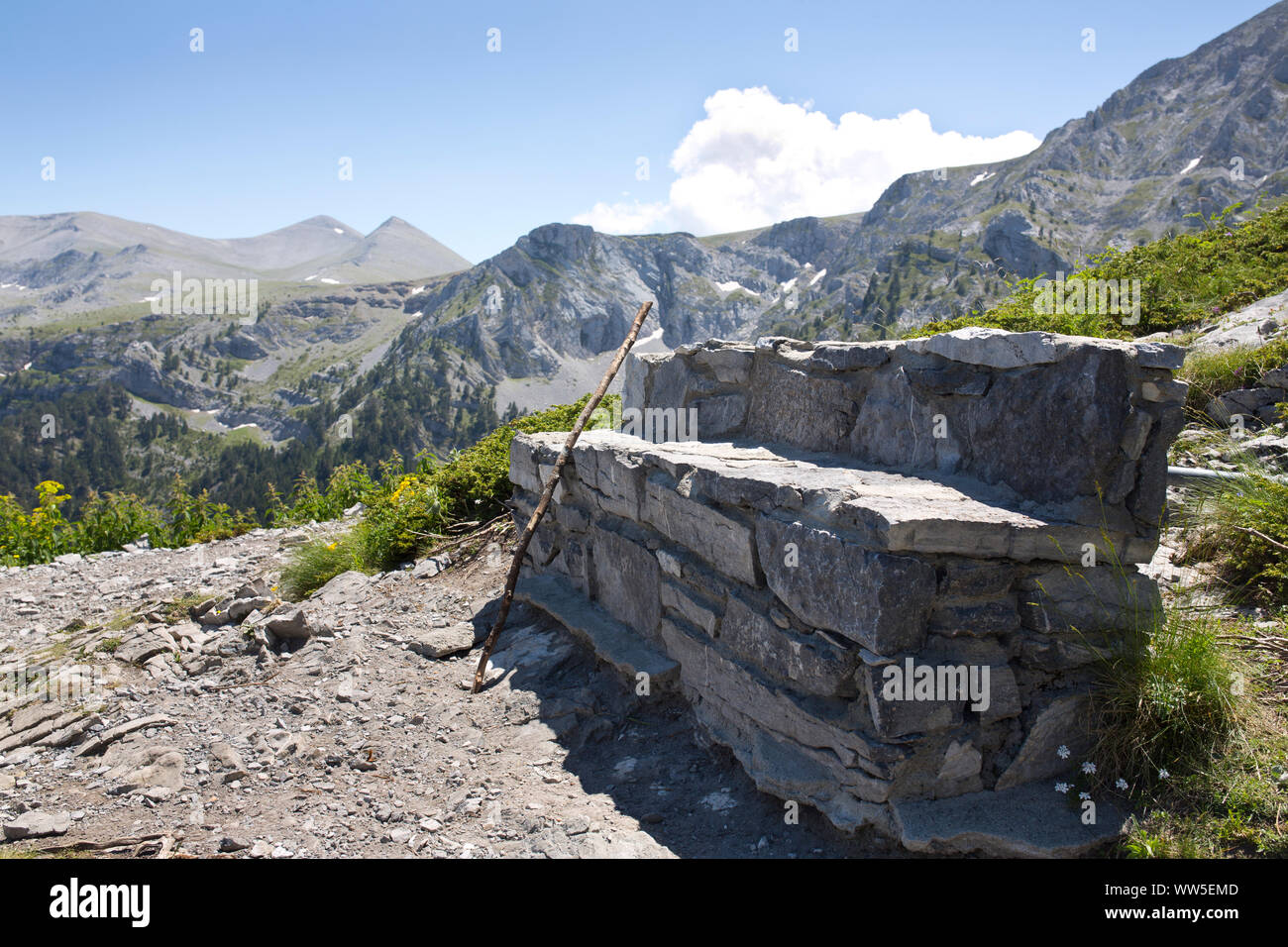Panoramic picture of a stone bench at a slope hi-res stock photography ...