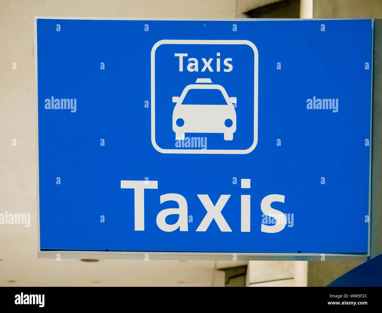 Blue taxi sign board at Paris airport, France Stock Photo - Alamy