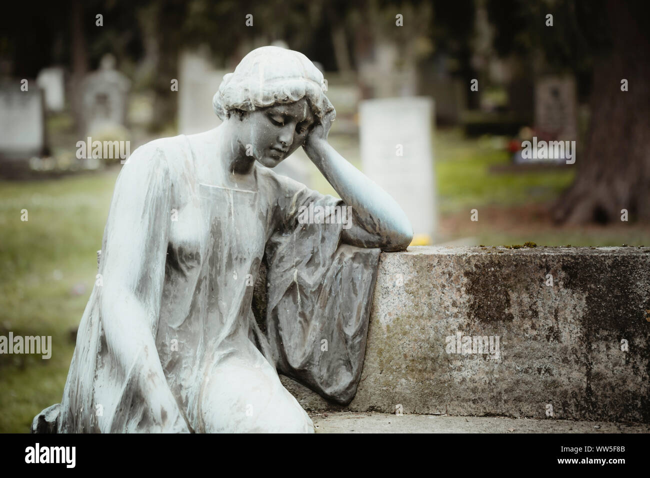 Statue Sitting Cemetery High Resolution Stock Photography and Images ...