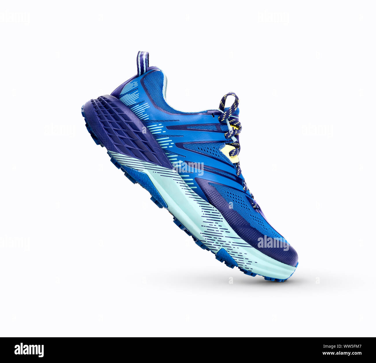 A side view of Blue Trainers Isolated on a white background Stock Photo ...