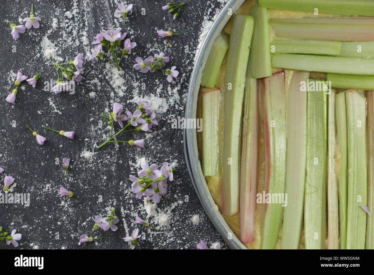 Rhubarb cake with purple blossoms Stock Photo - Alamy