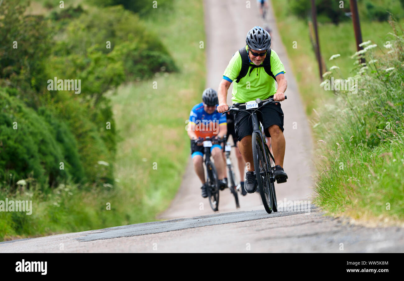 ROTHBURY, NEWCASTLE UPON TYNE, ENGLAND, UK - JULY 06, 2019: An older ...