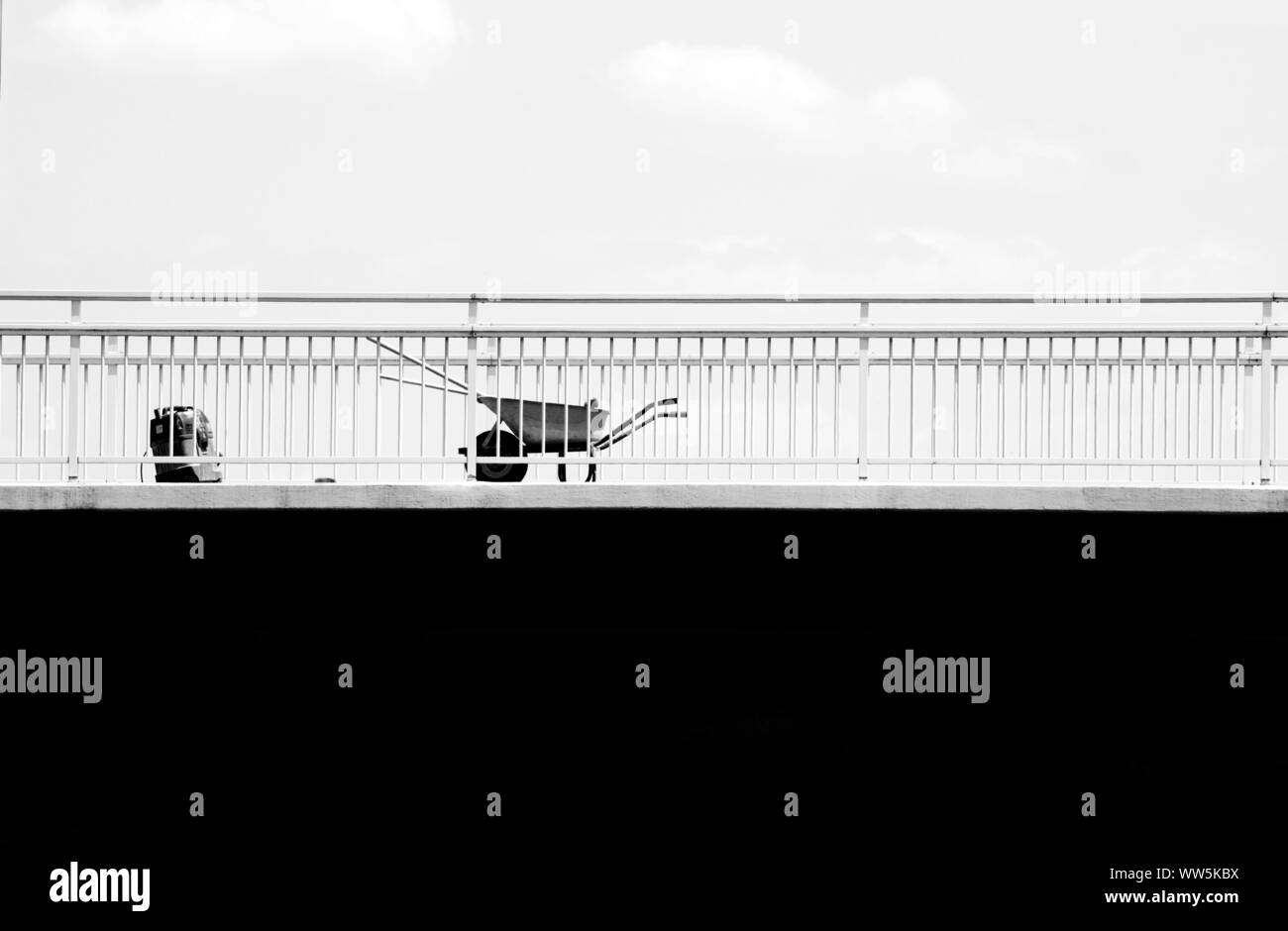 Photography of construction site with cleaning implements on a bridge ...