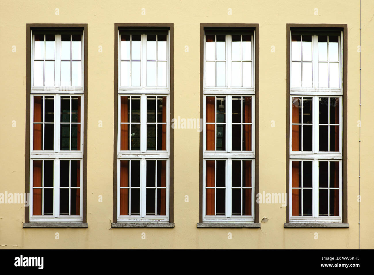 Photography of four windows in a rows Stock Photo - Alamy