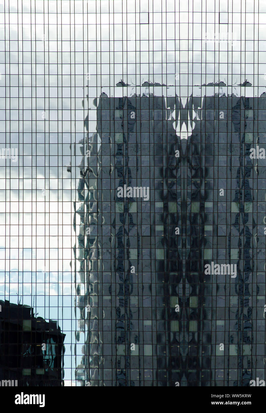 abstract reflection of a high rise facade in another high rise Stock ...