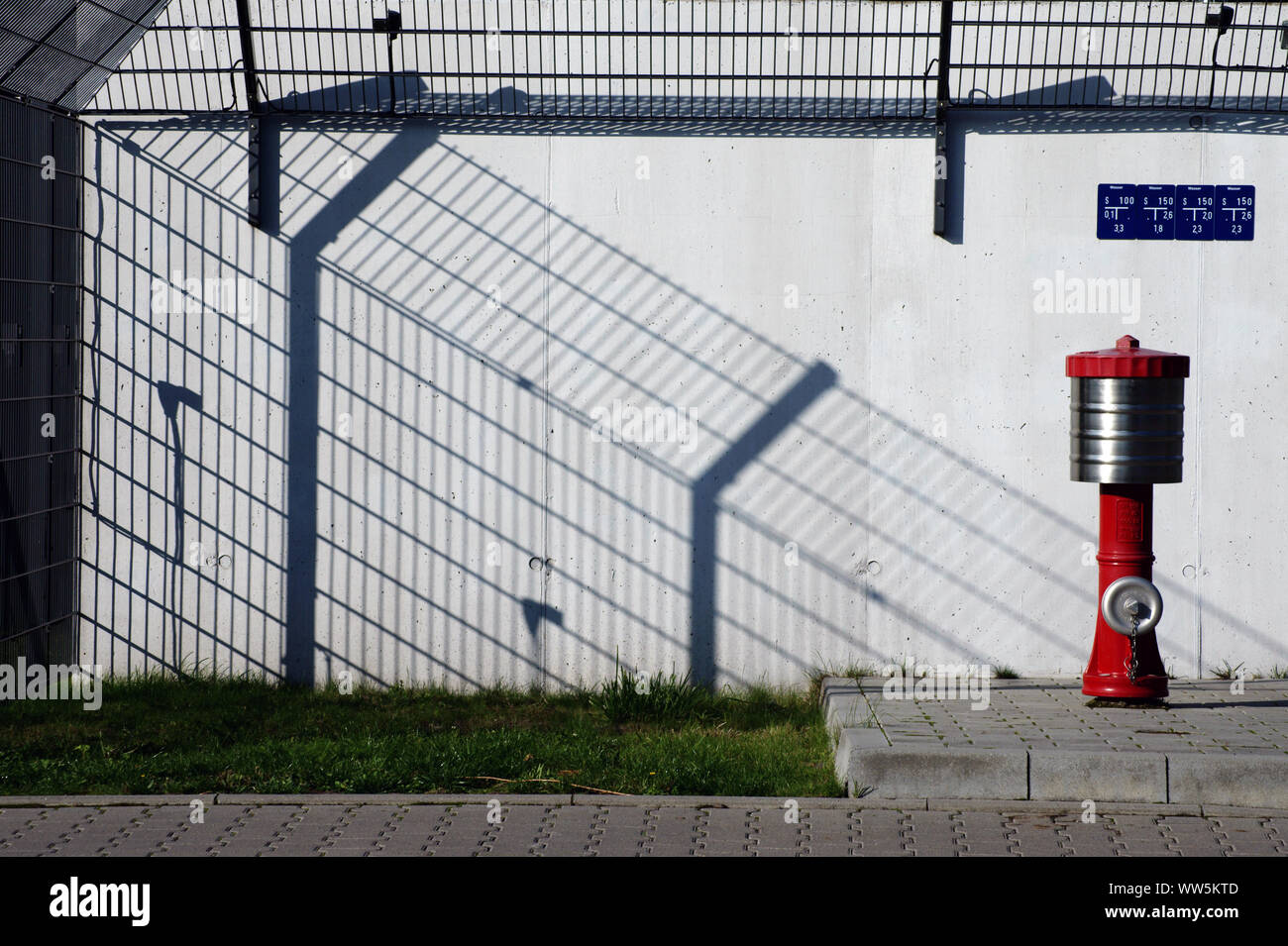 Architecture photography of an enclosure with shadows and a fire ...