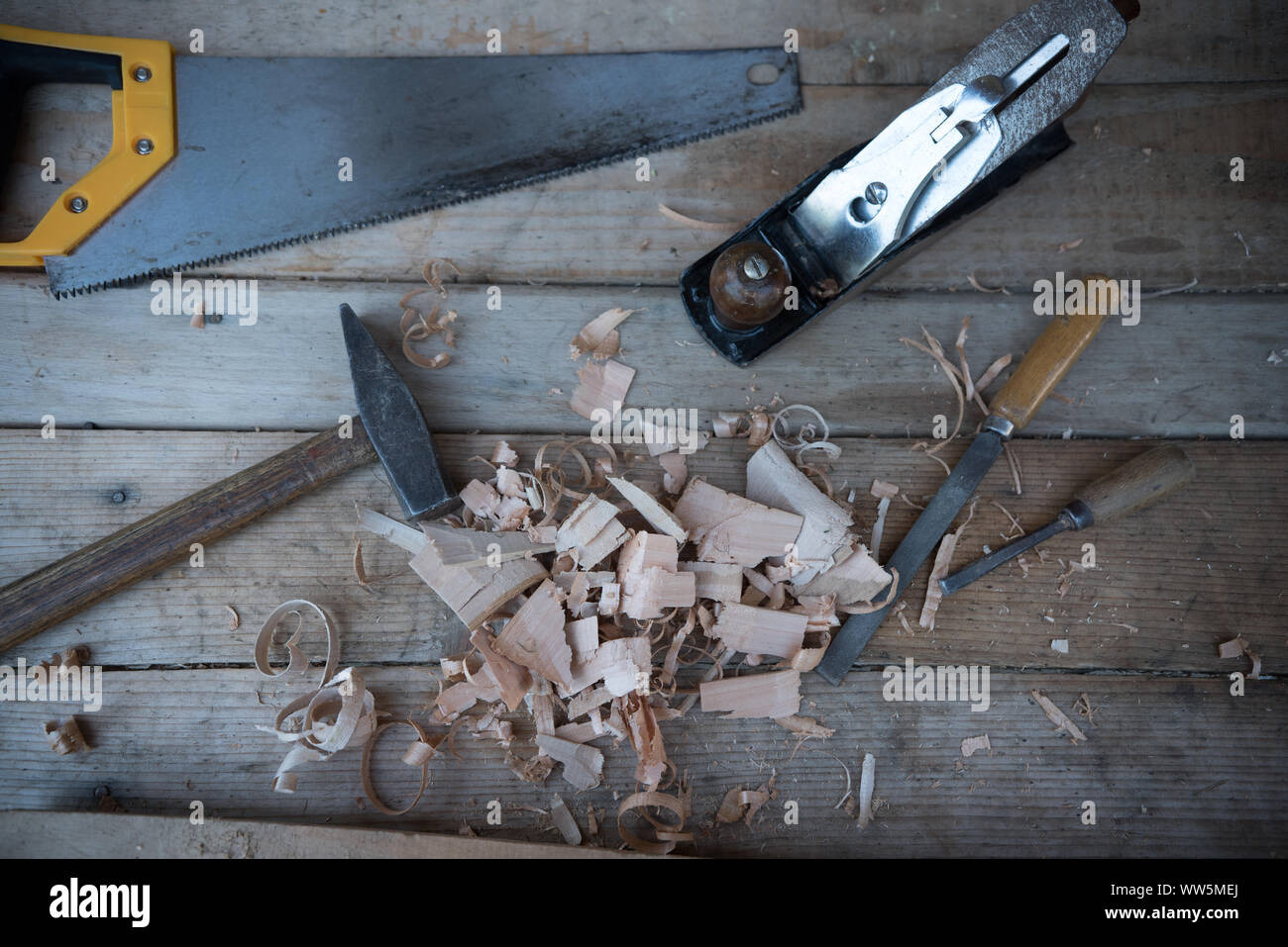 Overhead view of a carpentry tools and wood shavings Stock Photo - Alamy