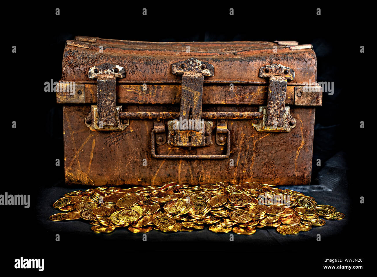 Stacking Gold Coin in treasure chest old on black background Stock ...