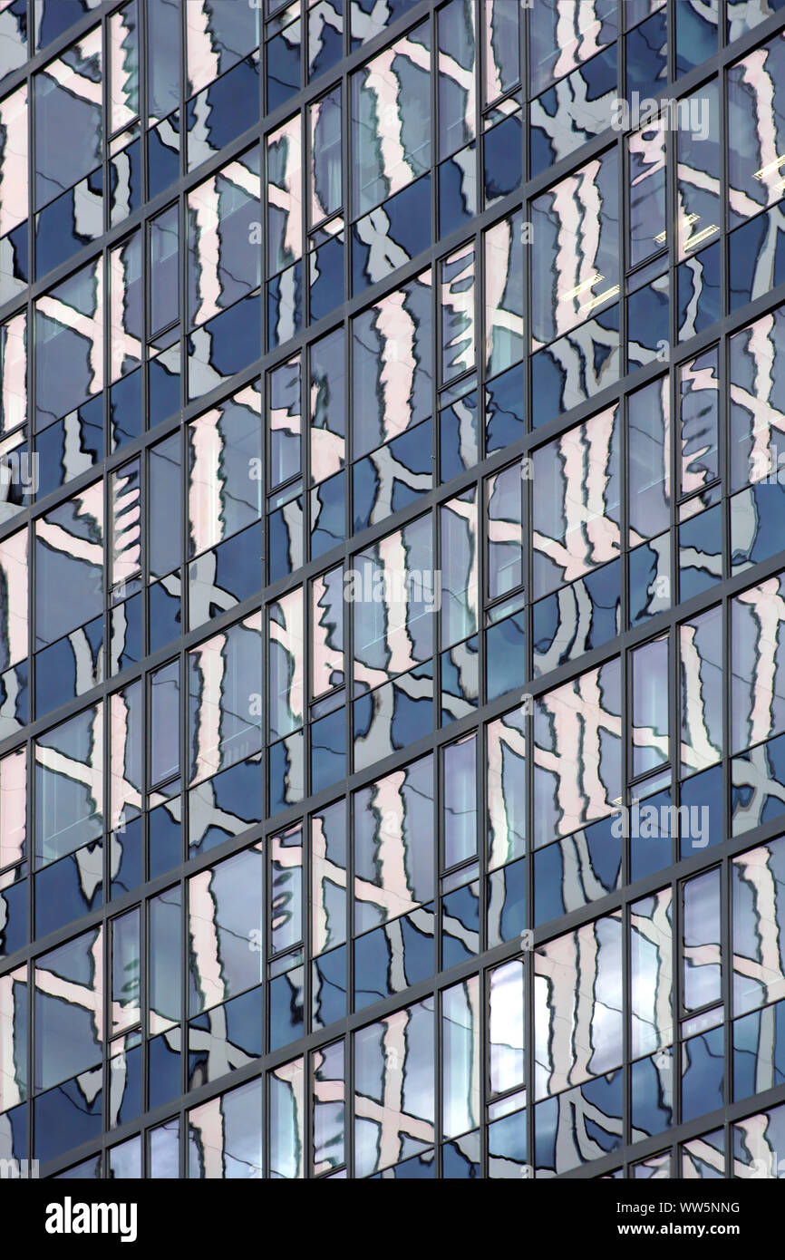 The abstract photography of high rise reflections in a high rise facade ...