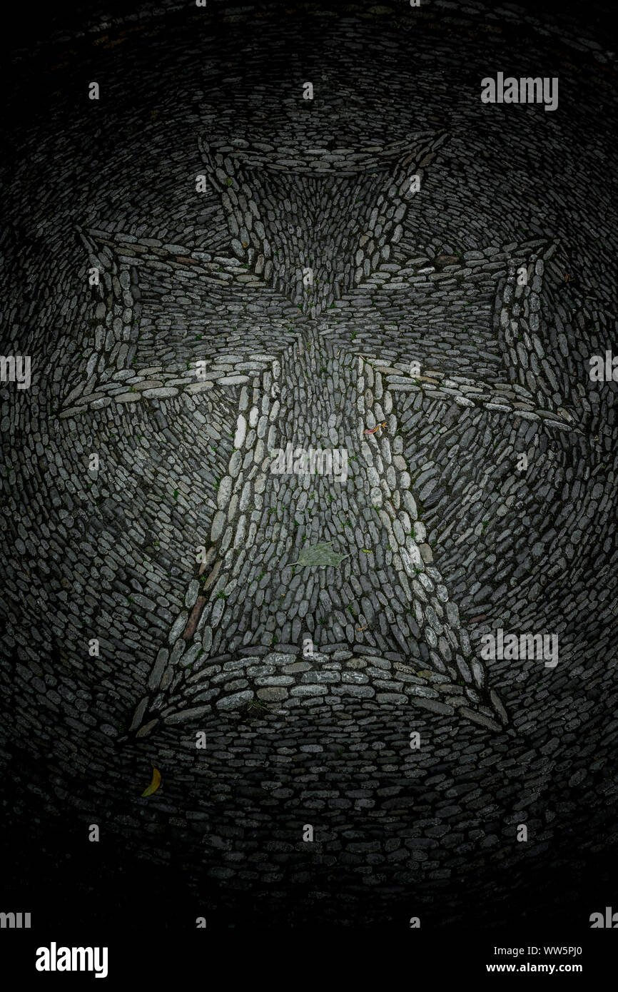 Cross symbol with paving stones hi-res stock photography and images - Alamy