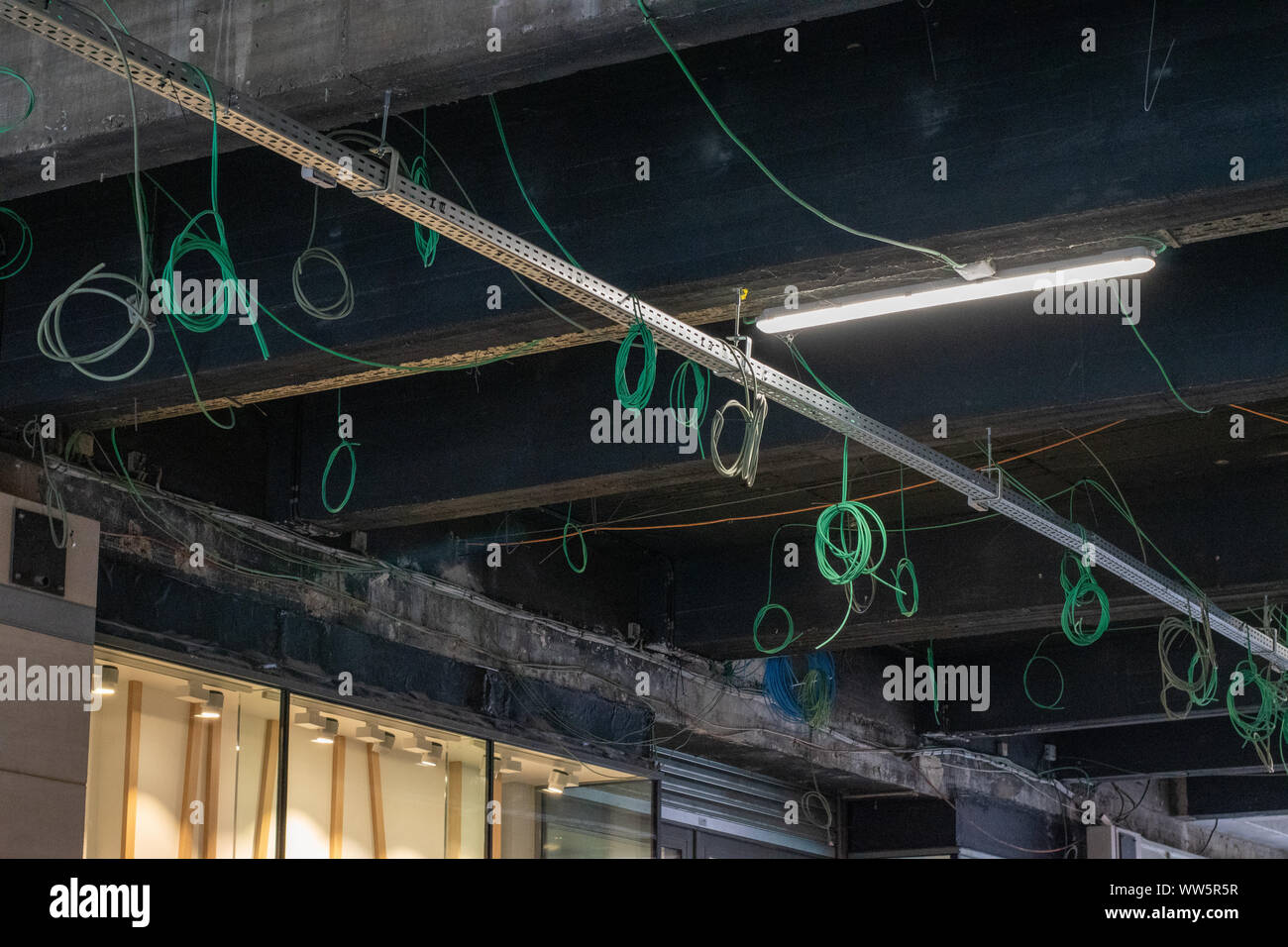 Renovation of the ceiling and neon lights at a shopping centre / mall ...