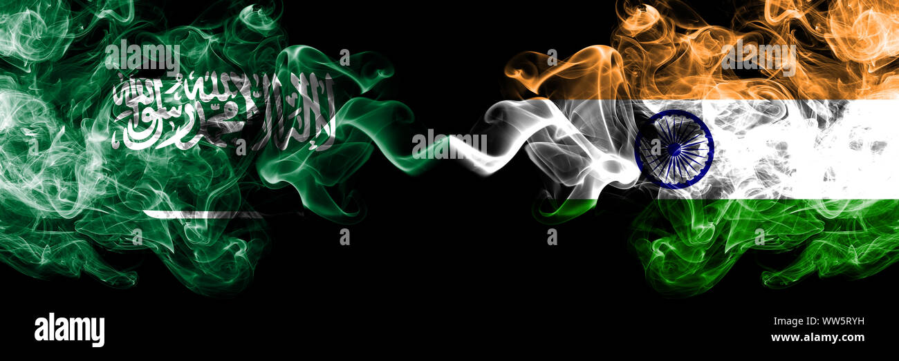 Saudi Arabia Kingdom vs India, Indian smoky mystic flags placed side by ...