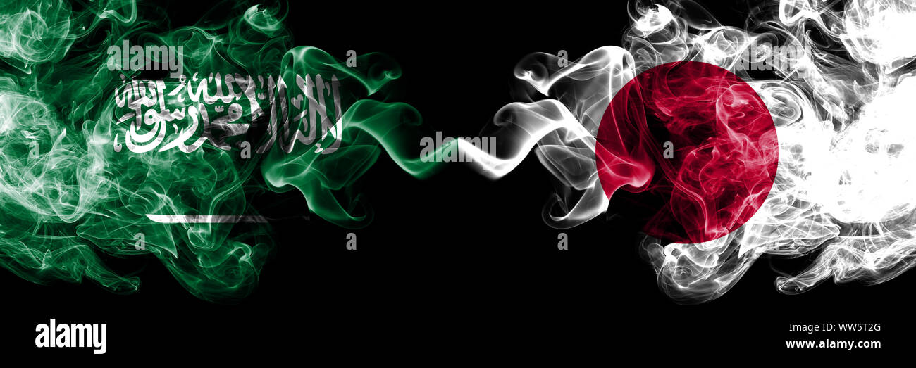 Saudi Arabia Kingdom vs Japan, Japanese smoky mystic flags placed side ...