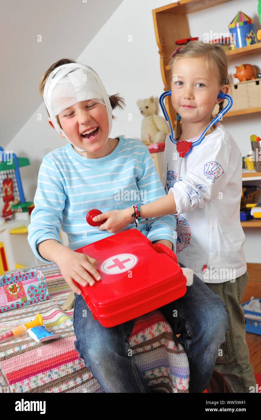 Boy Girl Playing Doctor High Resolution Stock Photography and Images ...